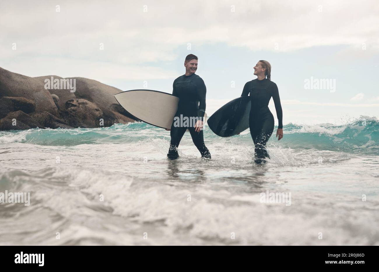 We have a deep appreciation for the ocean. a young couple out surfing ...