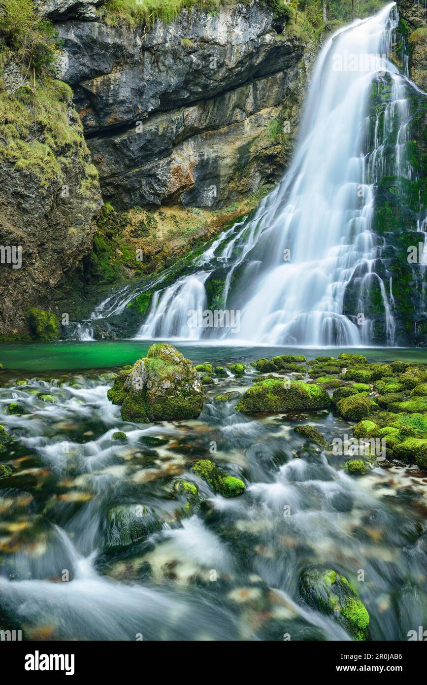 Waterfall cascading in green pond, Gollinger Wasserfall, Golling ...