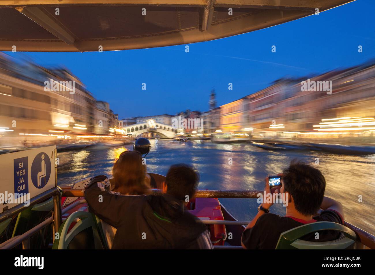 Vaporetto, water bus, public transport, passengers, night, lights ...