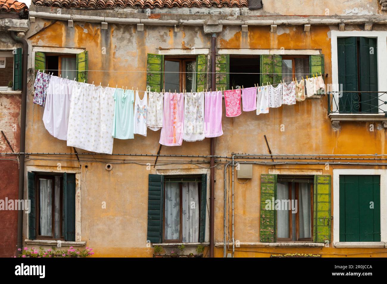 typical, washing line strung outside window above canal, Castello ...