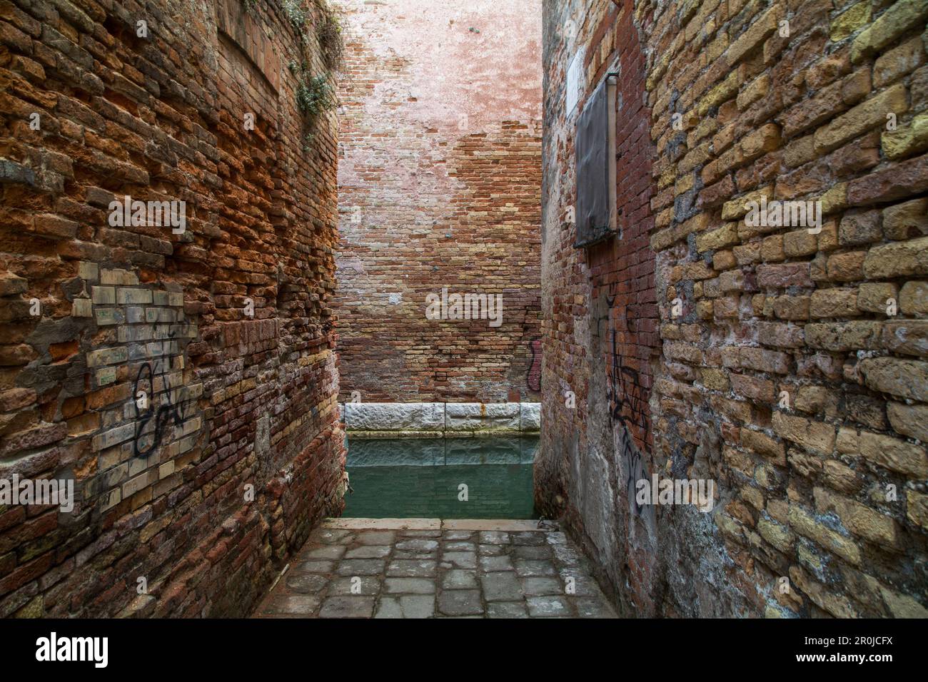 alley, old crumbling brick walls, facade, canal, water, stone walls ...