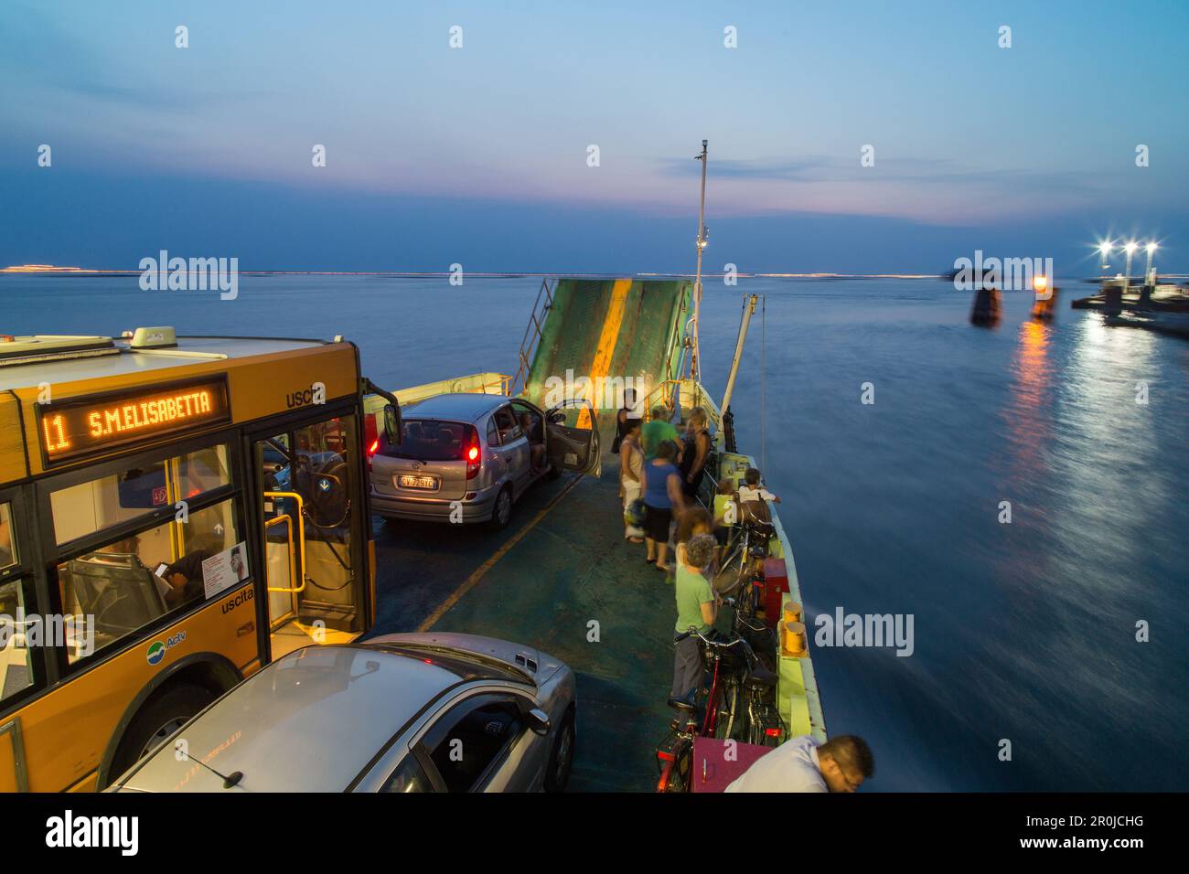 Night photo, car ferry with bus, motion, between Santa Maria del Mare ...