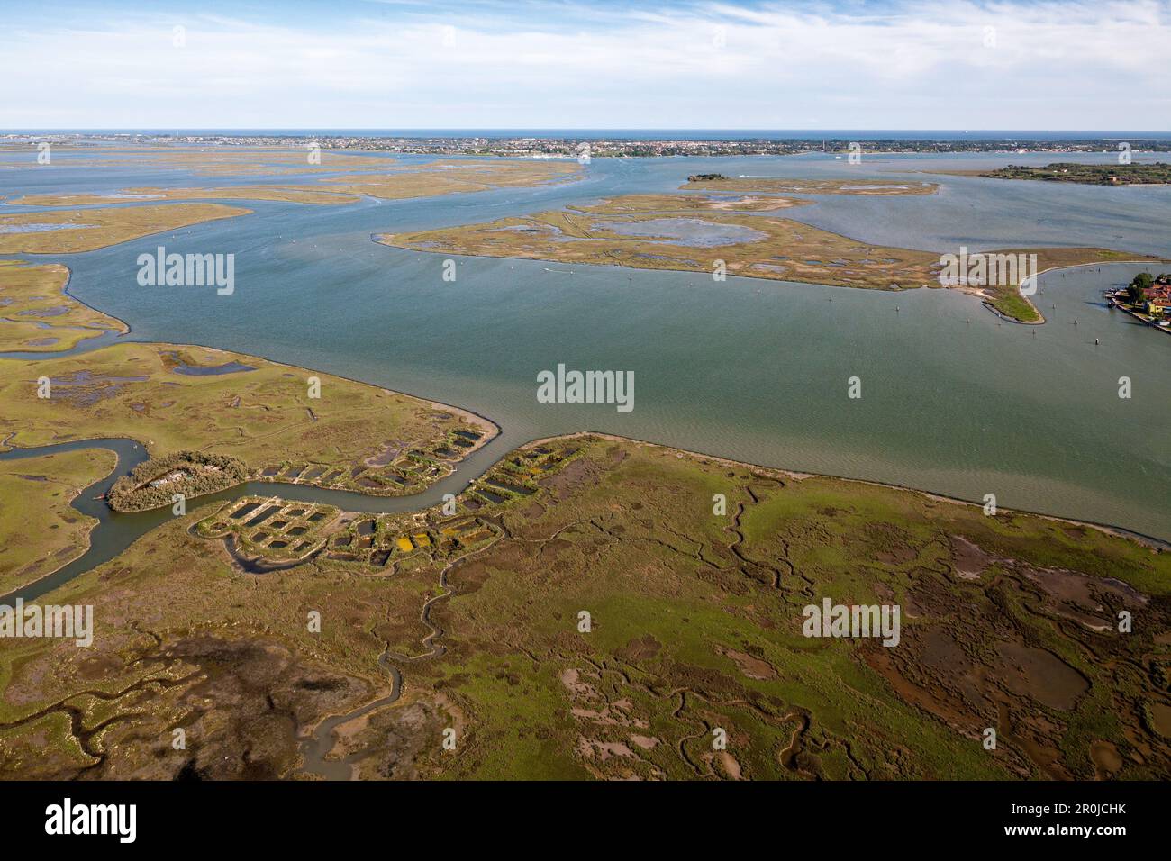 aerial of salt marshes, barene, Canal di Burano, traditional fish ...