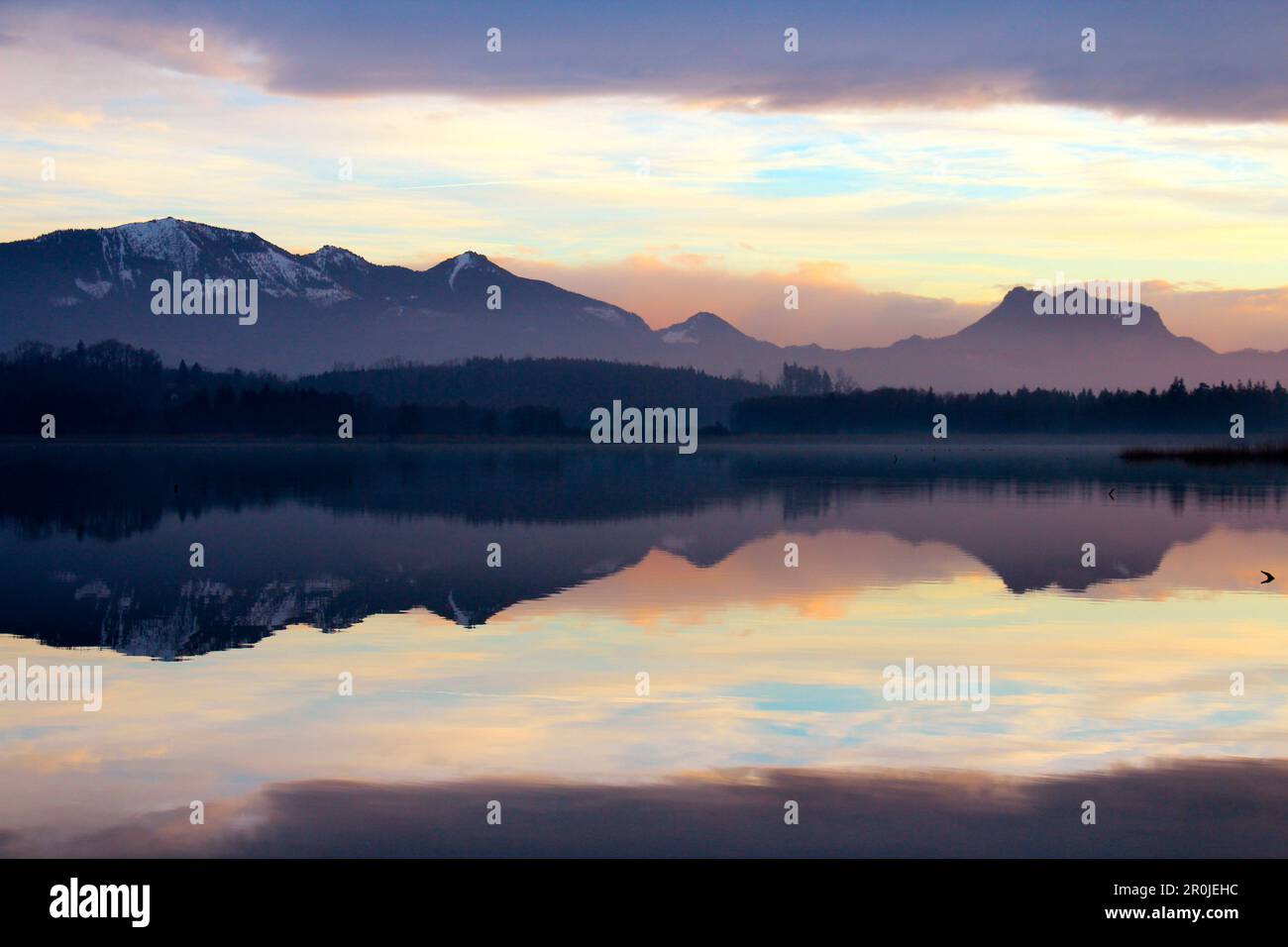 Reflection of Chiemgau Alps with Hochries in Lake Simssee, Upper avaria ...