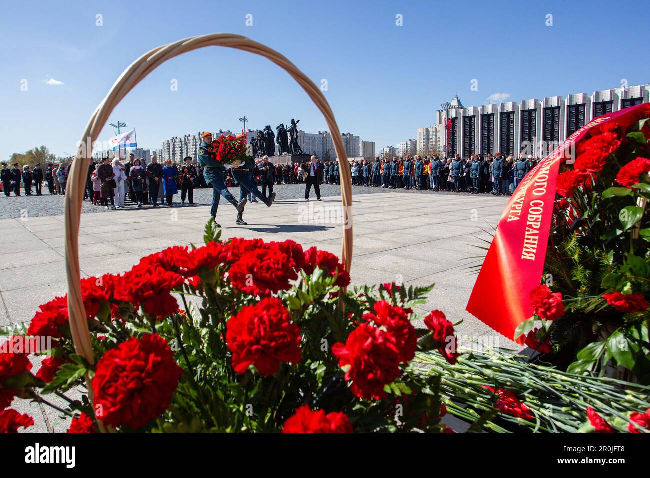 Ceremonial participants seen during a flower-laying ceremony to honor ...