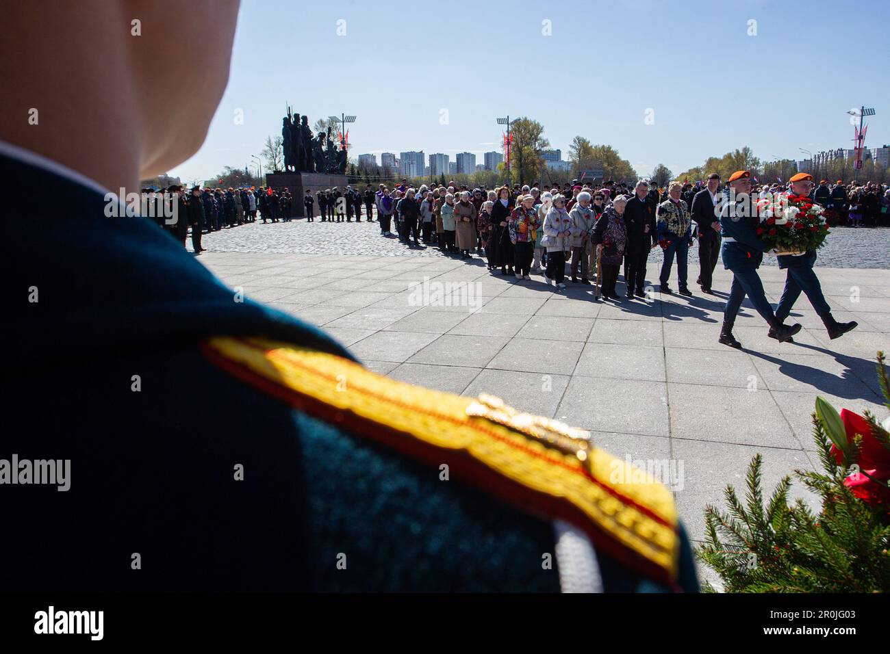 Ceremonial participants seen during a flower-laying ceremony to honor ...