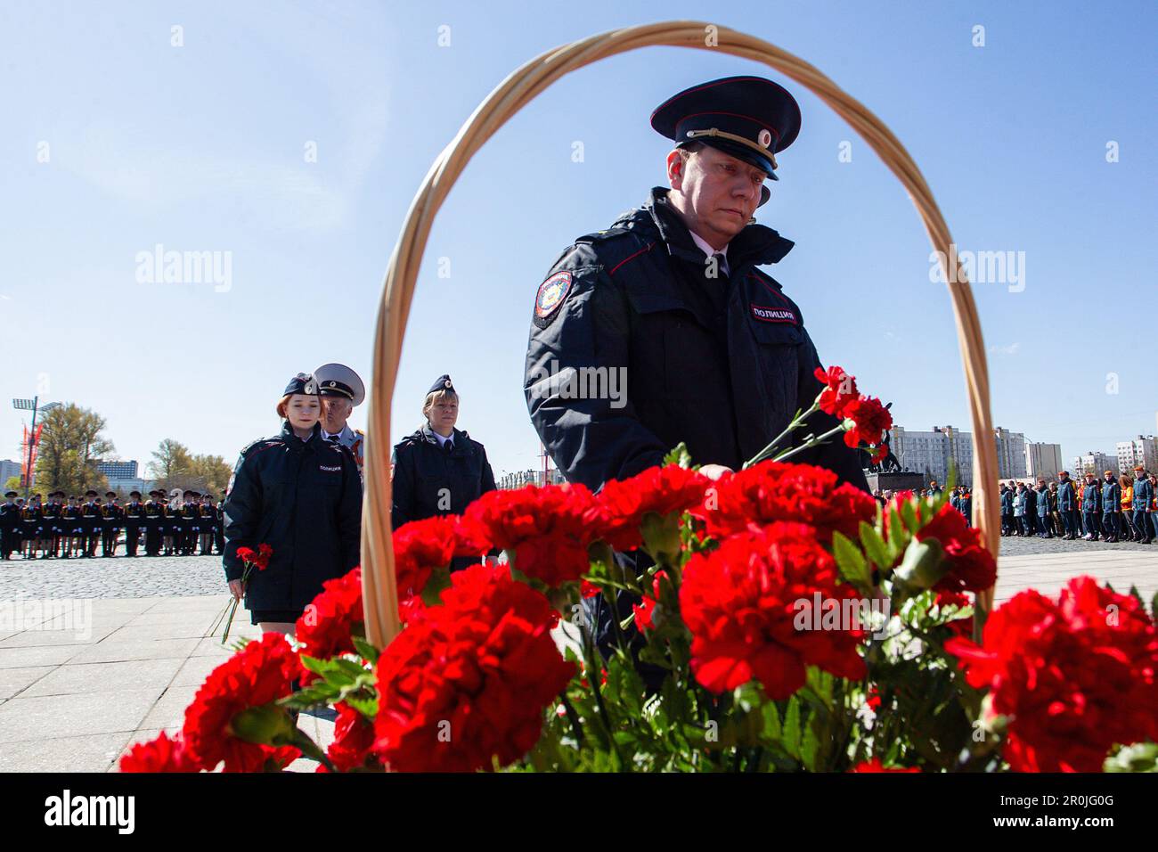 Russian military officers seen during a flower-laying ceremony to honor ...