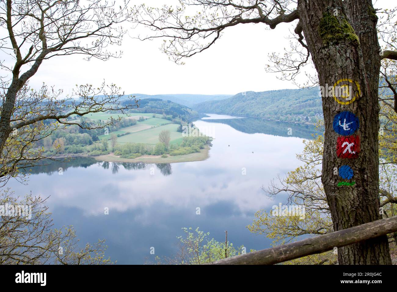 View of Lake Edersee from Kahle Hard Route with direction signs on a ...