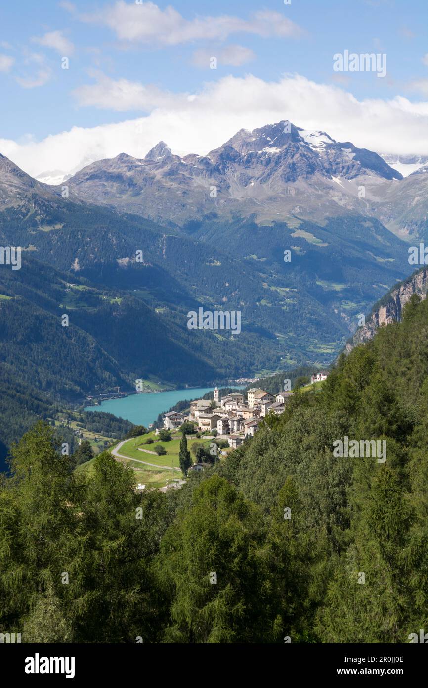 The village of Viano high above the valley of Poschiavo, surrounded by ...