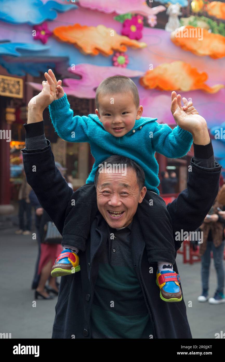 Father with son on shoulders in Old Town (Nanshi), Shanghai, China ...