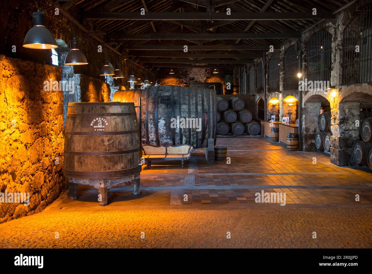 Port wine barrels in cellar of Burmester winery, Porto, Norte, Portugal ...