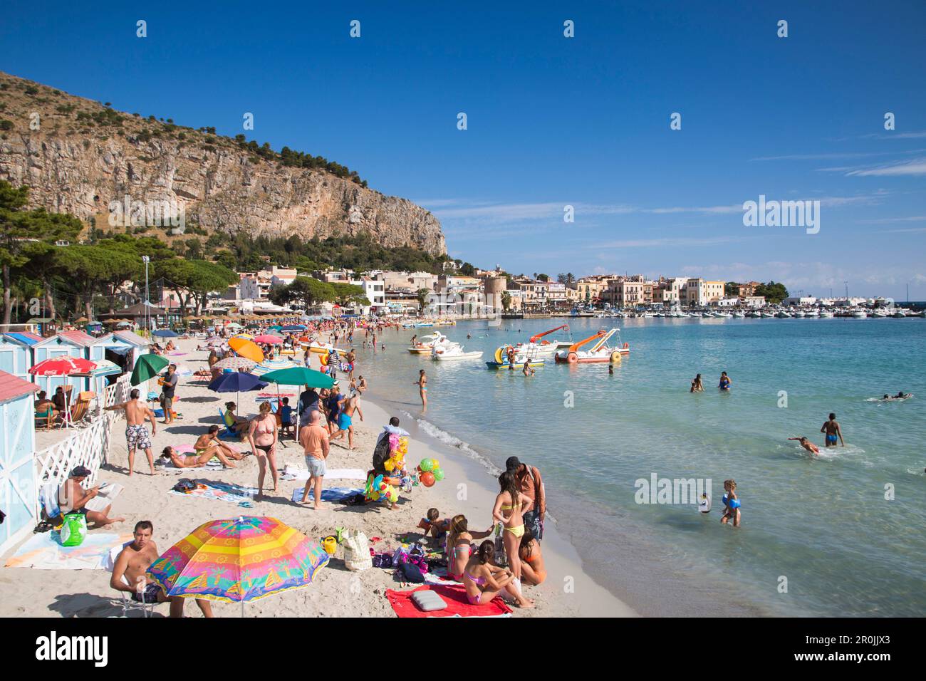 People enjoy sunny Sunday morning at Mondello beach, Mondello, near ...