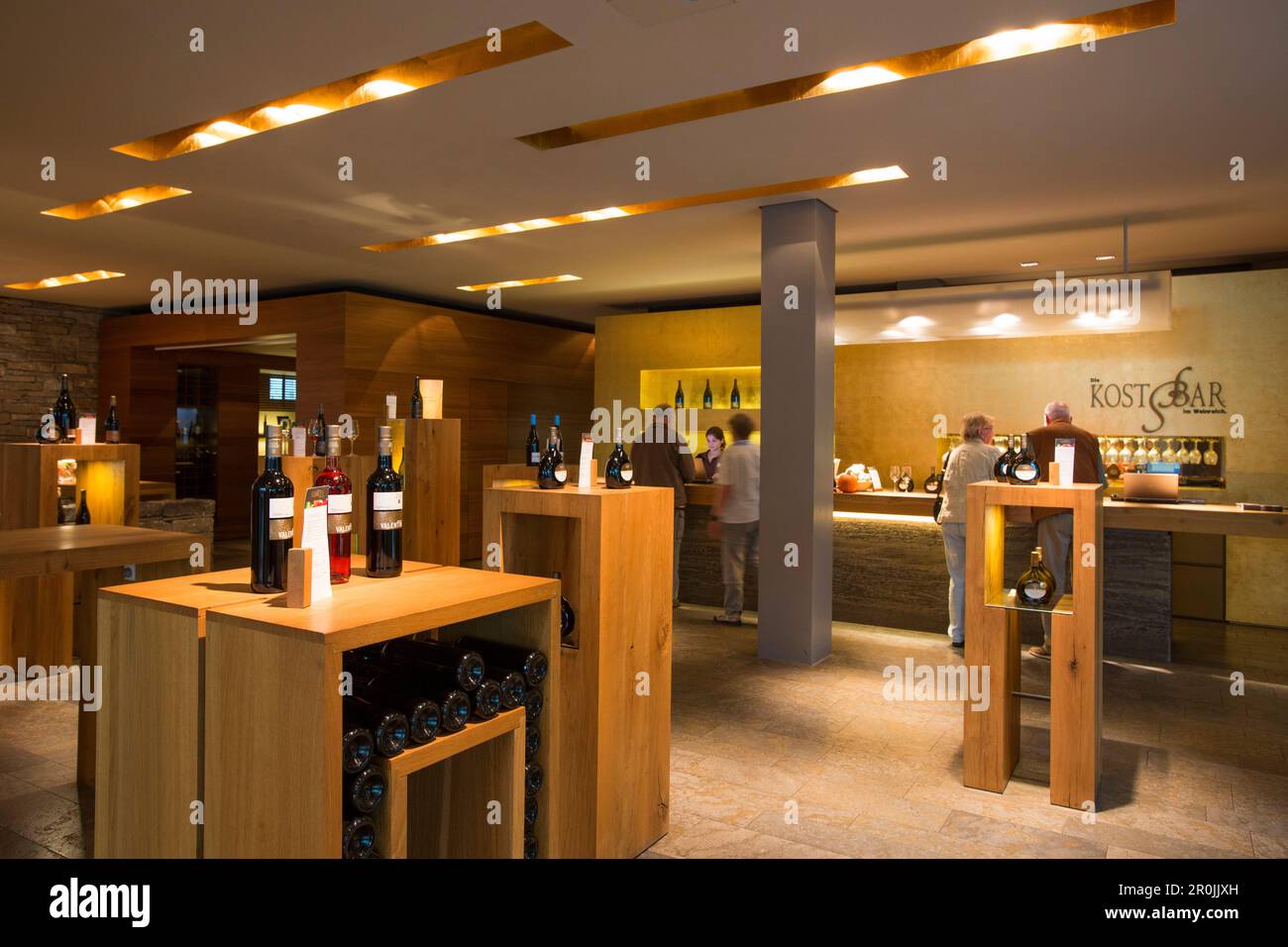 People sample wines in Weinreich wine tasting room at Winzerkeller ...