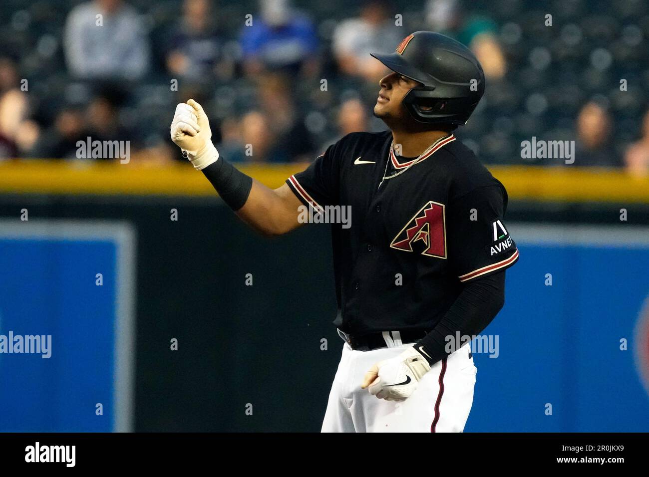 Arizona Diamondbacks catcher Gabriel Moreno (14) reacts after hitting a ...