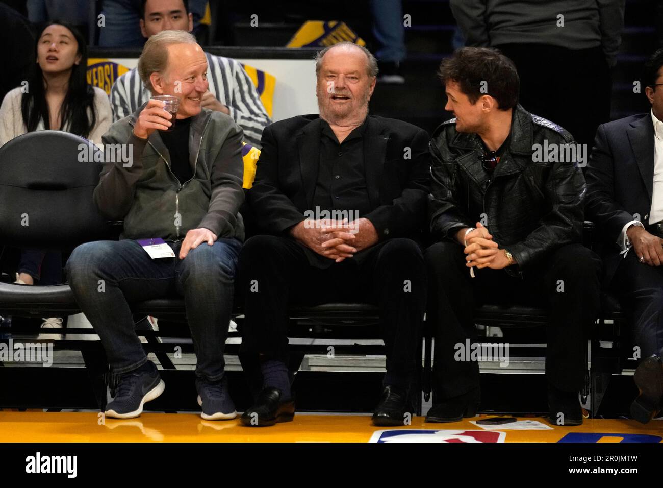 Actor Jack Nicholson, center, sits with his son Ray, right, and sports ...