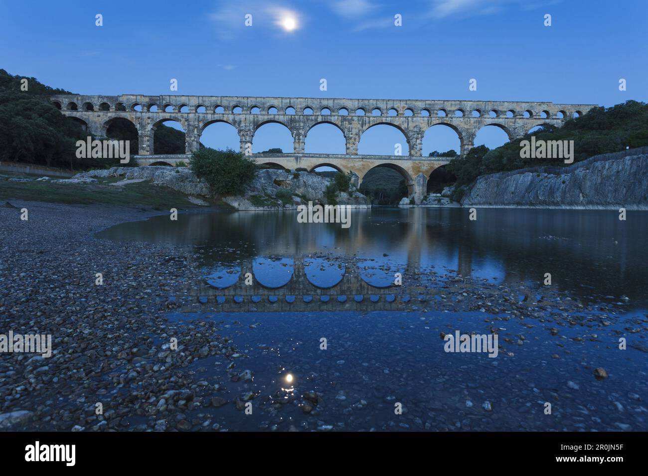 moon above the Pont du Gard, Roman aqueduct and bridge, Gardon river ...