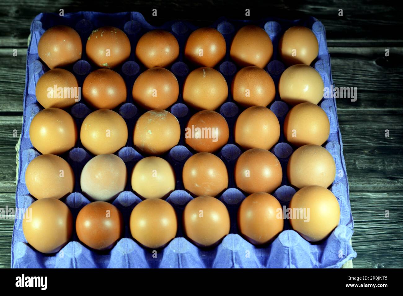 Pile of organic brown fresh and raw hen chicken eggs, stack of eggs ...