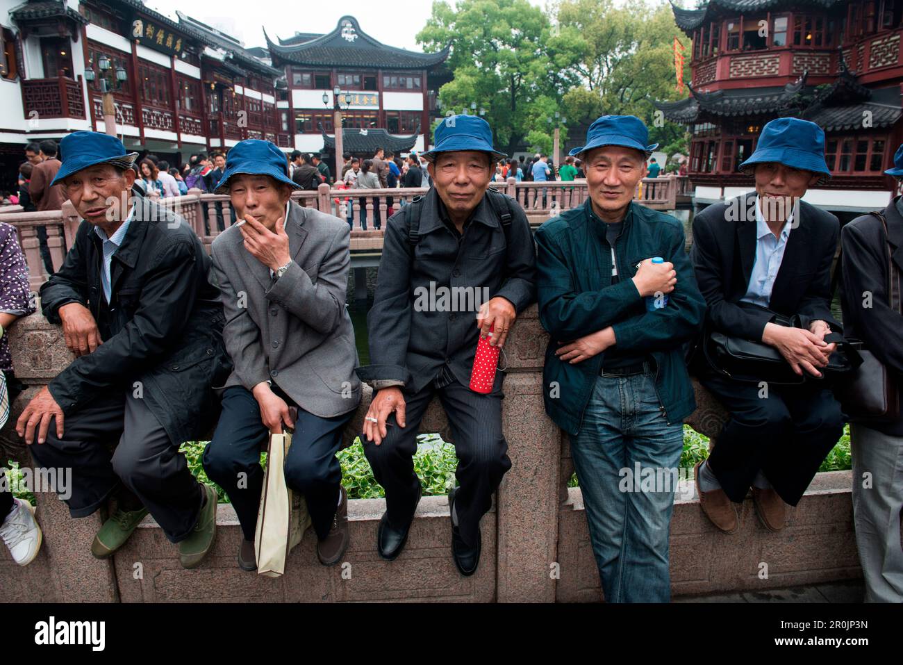 Group of five men with blue hats in Old Town (Nanshi), Shanghai ...