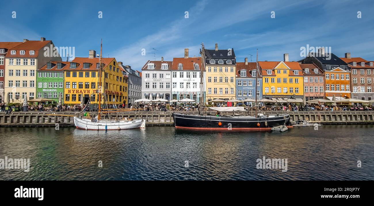 view of Nyhavn a 17th-century waterfront, canal and entertainment ...