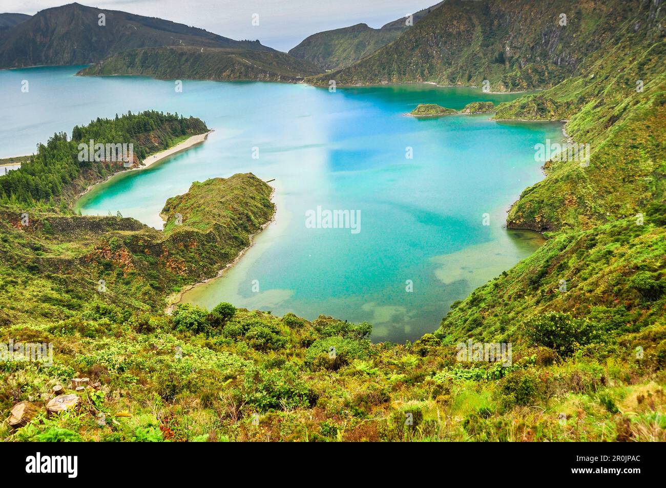 crater lake Lagoa do Fogo in the caldera of volcano Agua de Pau, Lagoon ...