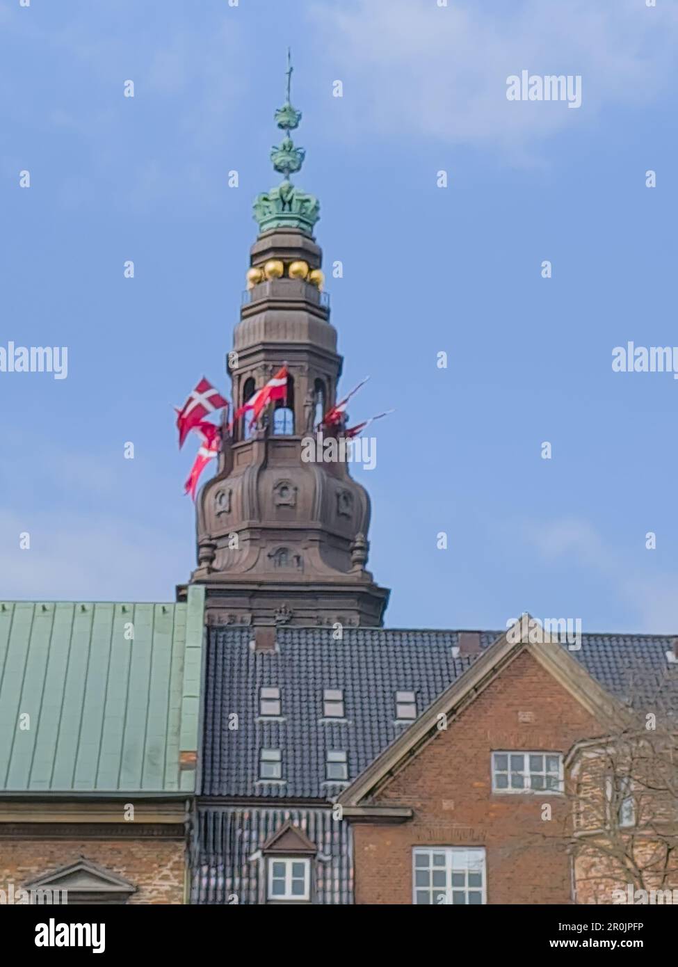 Baroque tower close up view on top of the Borg Danish parliament with ...