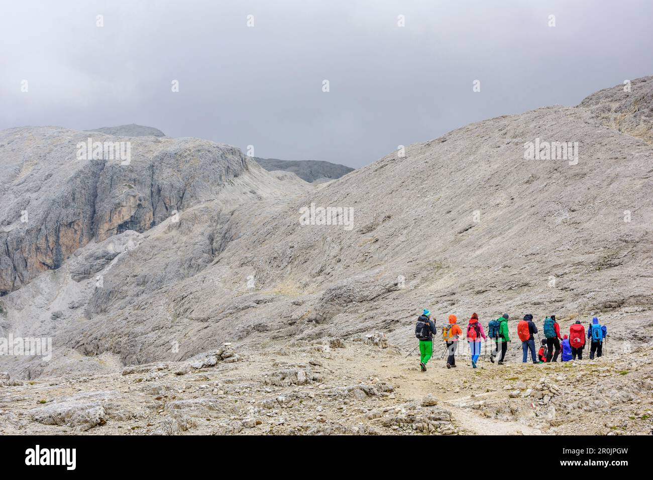 Several persons hiking on Pala plateau, Pala range, Dolomites, UNESCO ...