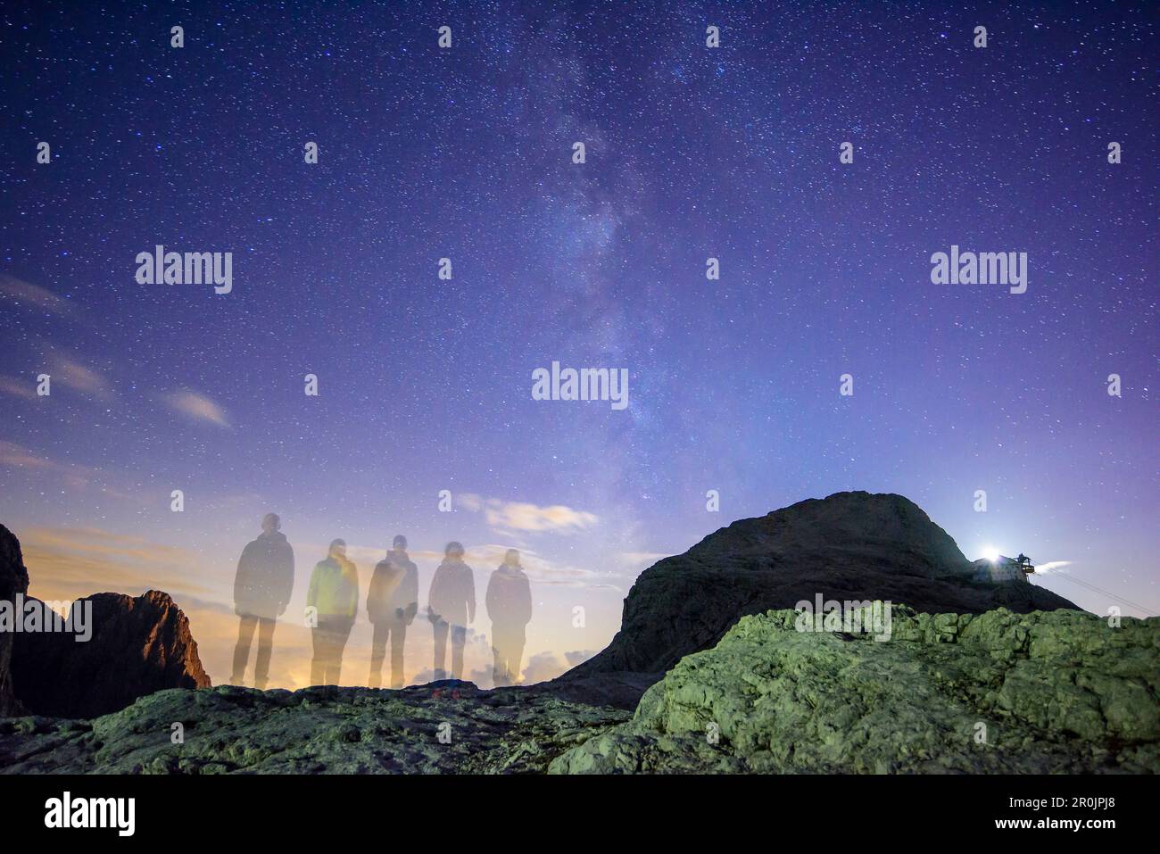 Several persons standing beneath stary sky with milky way, Rosetta in ...