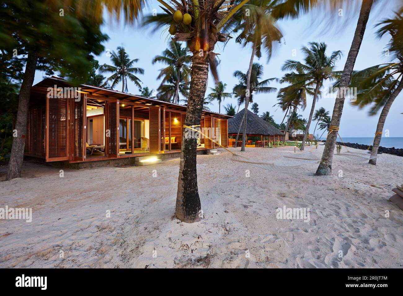 Guest bungalow and Restaurant under palm trees, Erandia Marari ...