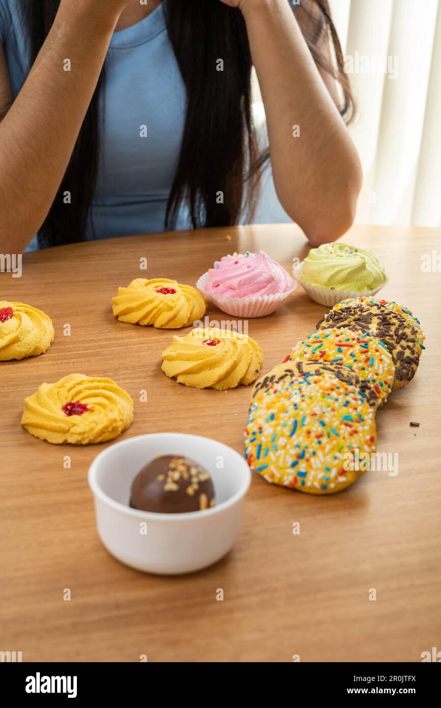 decoration of a table in a cafeteria full of desserts, cookies ...