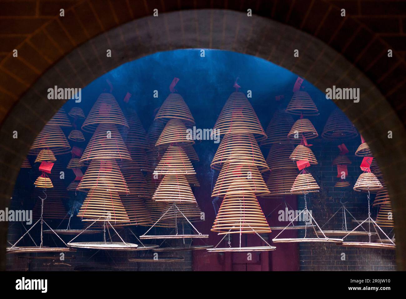 Incense burning, many incense coils, spiral, small temple, Causeway Bay ...