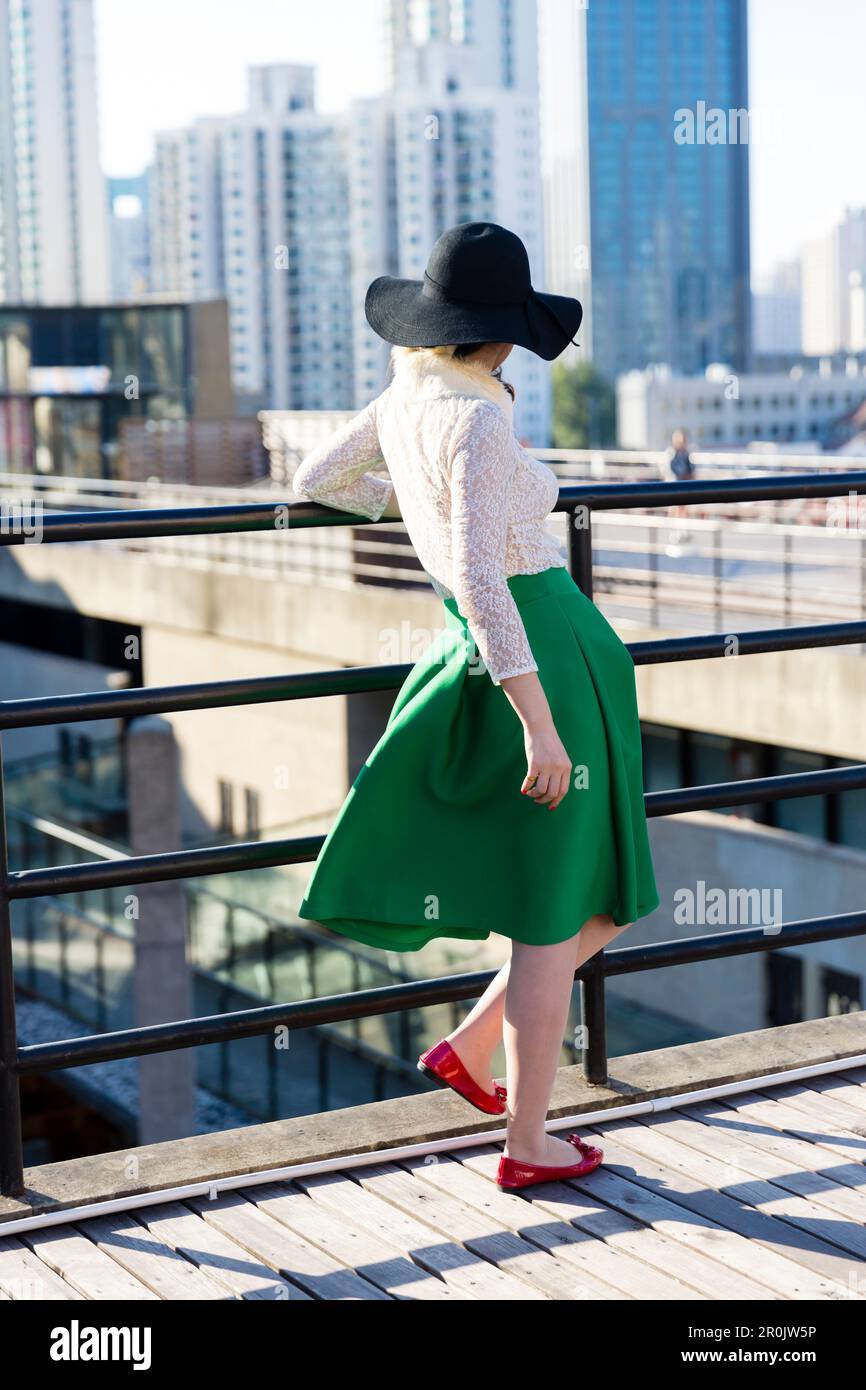 Women on roof, green skirt, hat, Shanghai 1933, 1933 Laochangfang ...