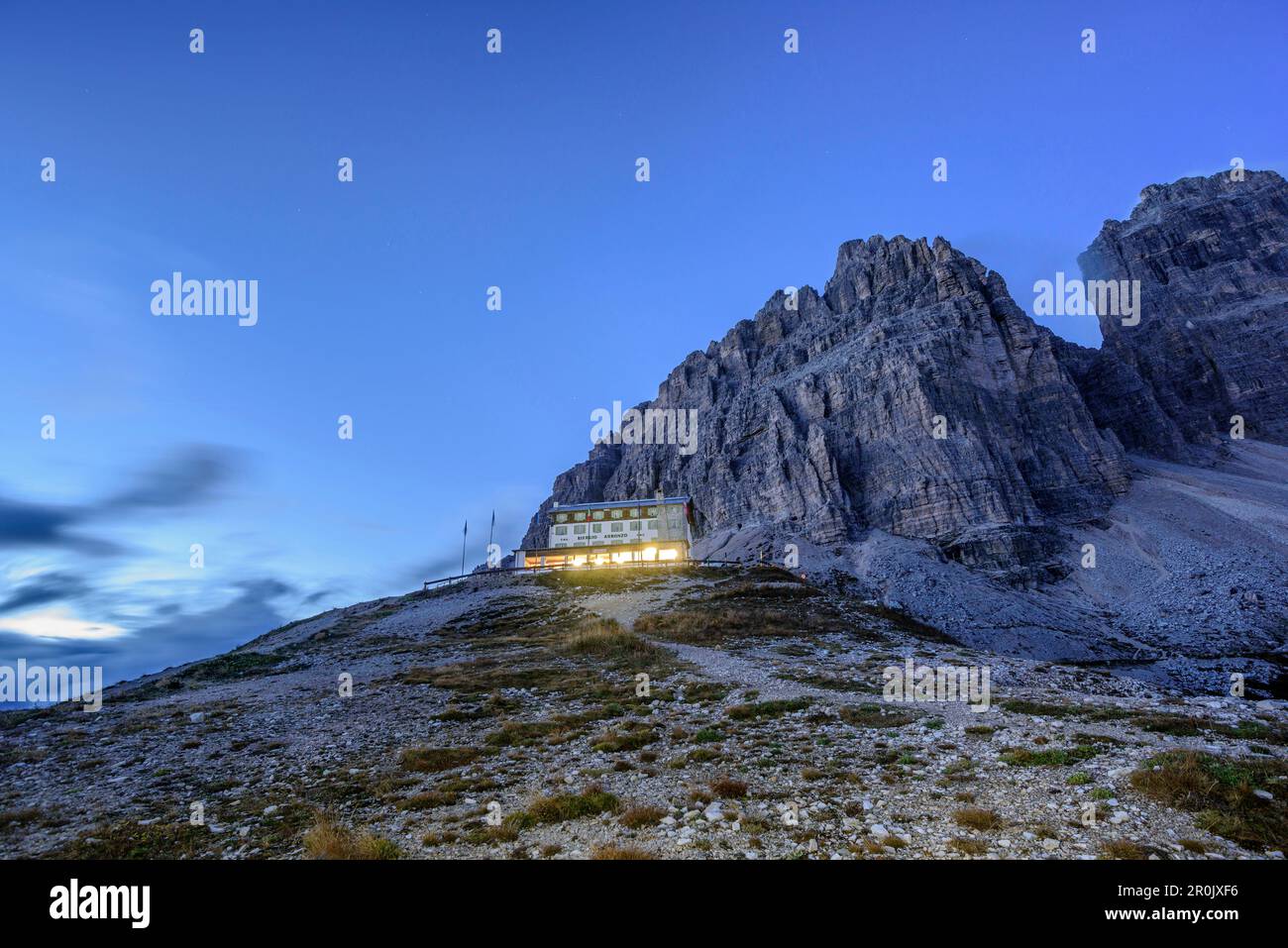 Illuminated hut Rifugio Auronzo with Tre Cime di Lavaredo, hut Rifugio ...