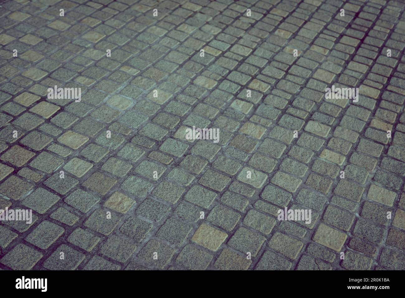 Cobblestone pavement texture background Stock Photo - Alamy