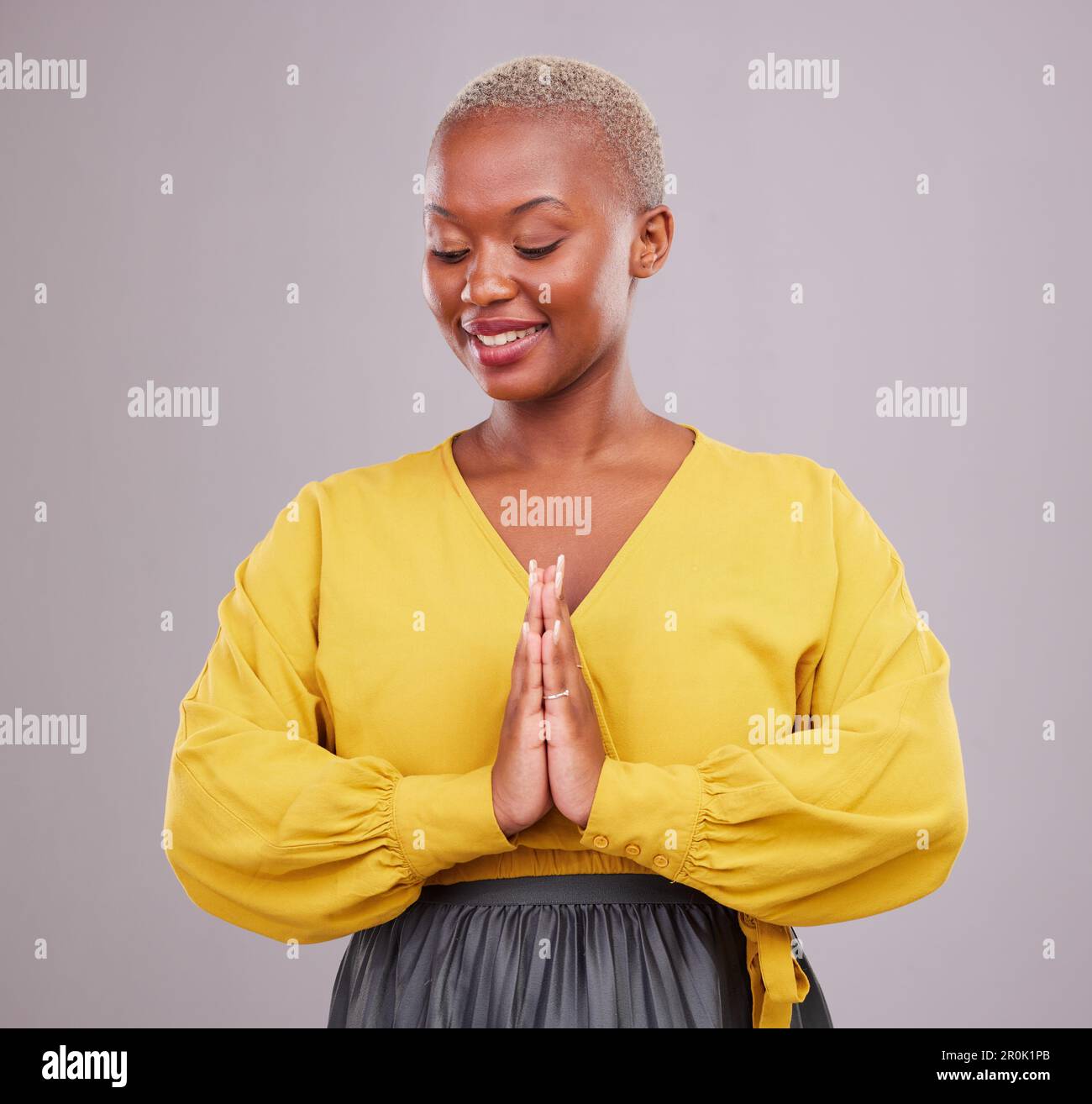 Hands together, smile and black woman with prayer, hope and religious ...
