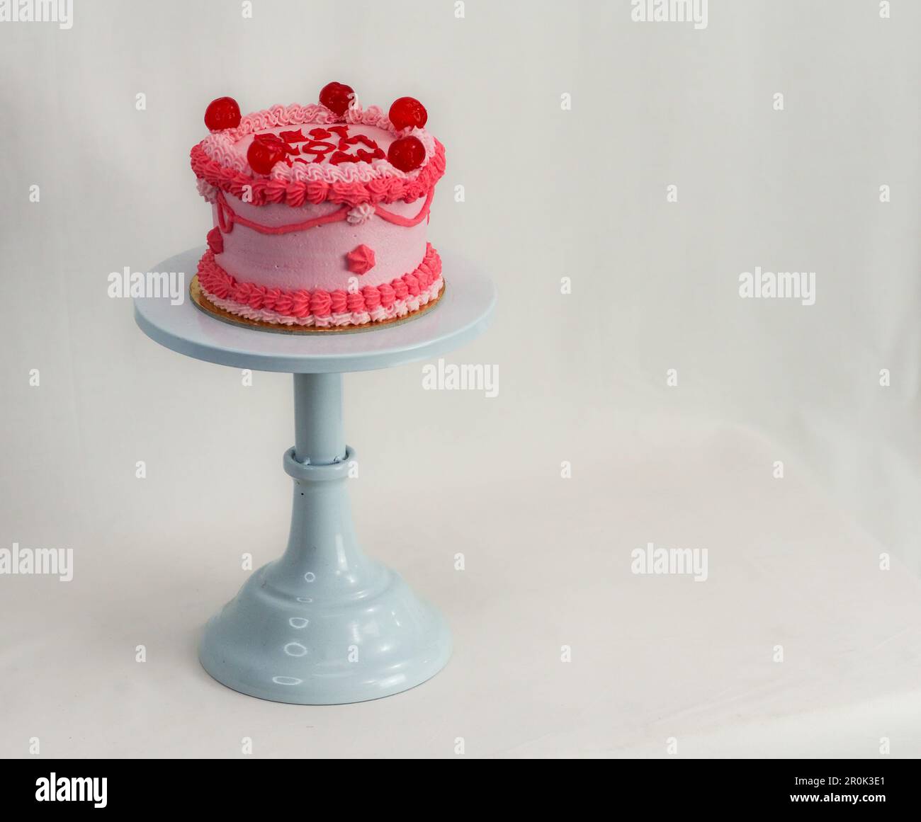 frosted pink red cake for mothers day celebration with funny text ...