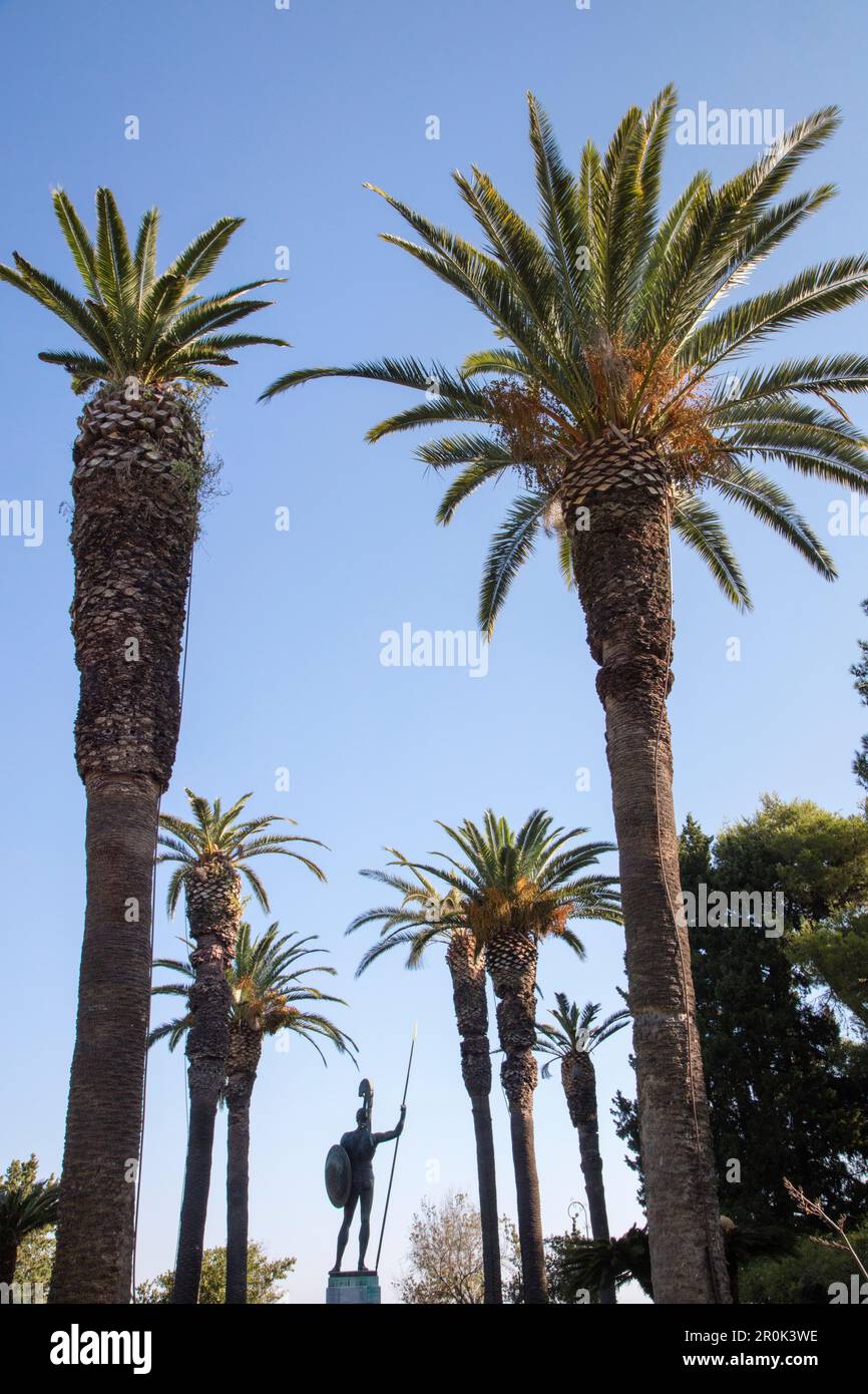 'Palm trees and statue in gardens of Achilleion Palace (build in 1891 ...