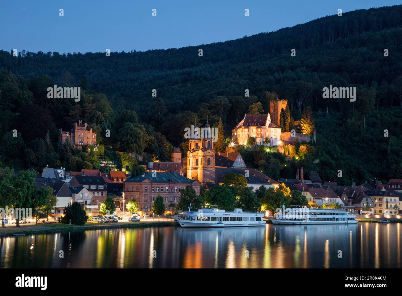 View from Mainbruecke bridge to city and excursion boats on Main river ...