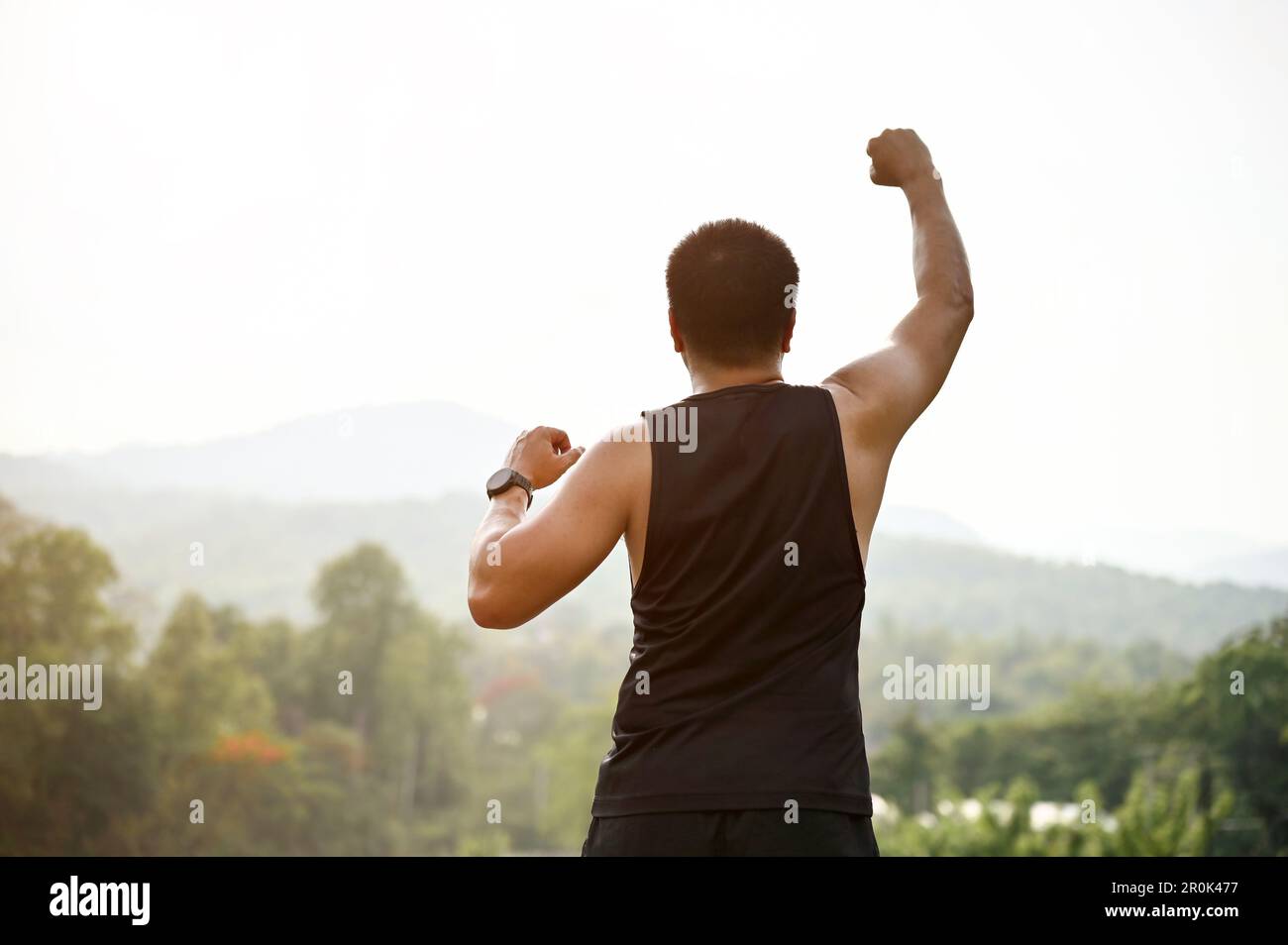 Man standing in nature raising hi-res stock photography and images - Alamy