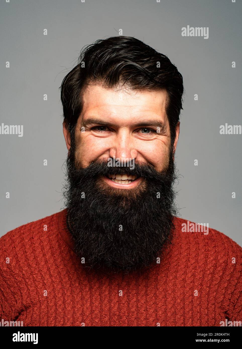 Happy man smile face. Handsome smiling young guy. Barber with long ...