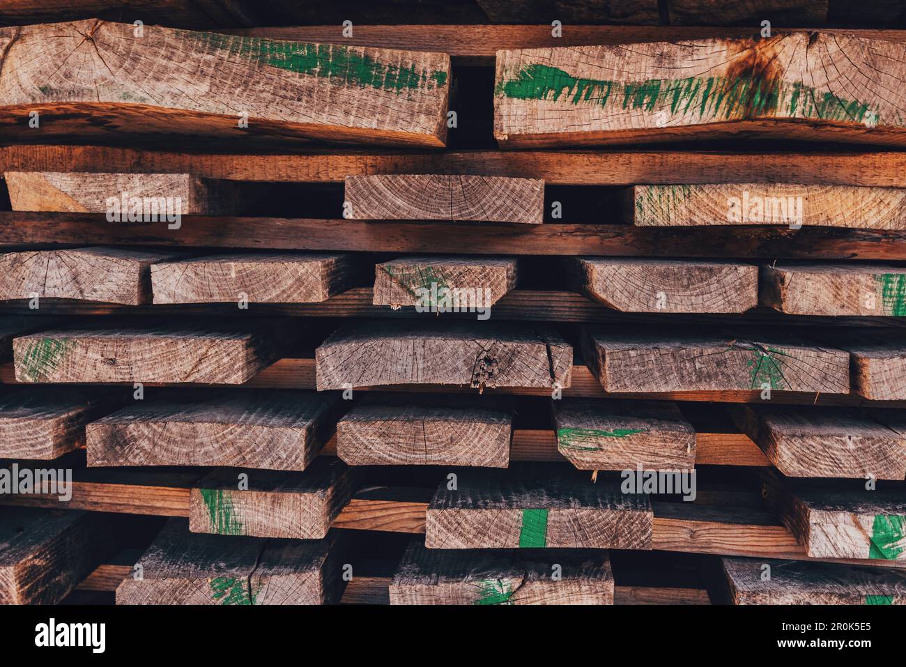 Stack of wooden planks solid-sawn timber construction material as ...