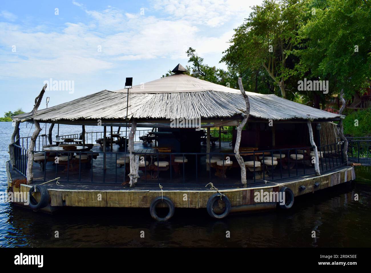 Floating outdoors restaurant and bar at Chobe Marina Lodge Stock Photo ...