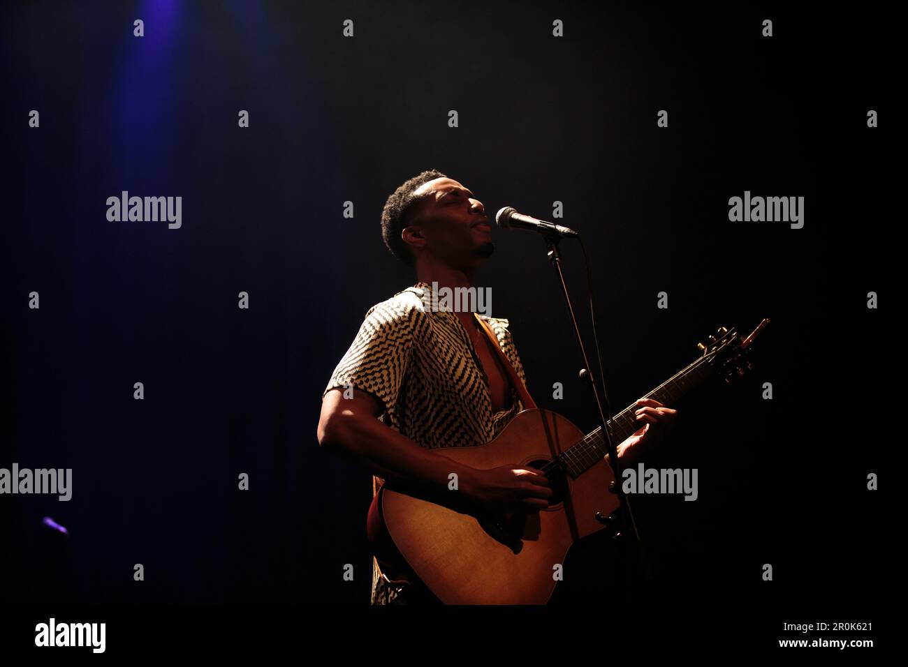 Toronto, Canada. 08th May, 2023. Joseph Solomon sings into a microphone ...