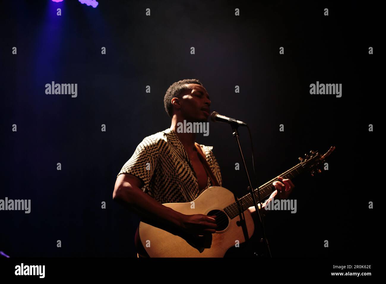 Toronto, Canada. 08th May, 2023. Joseph Solomon sings into a microphone ...