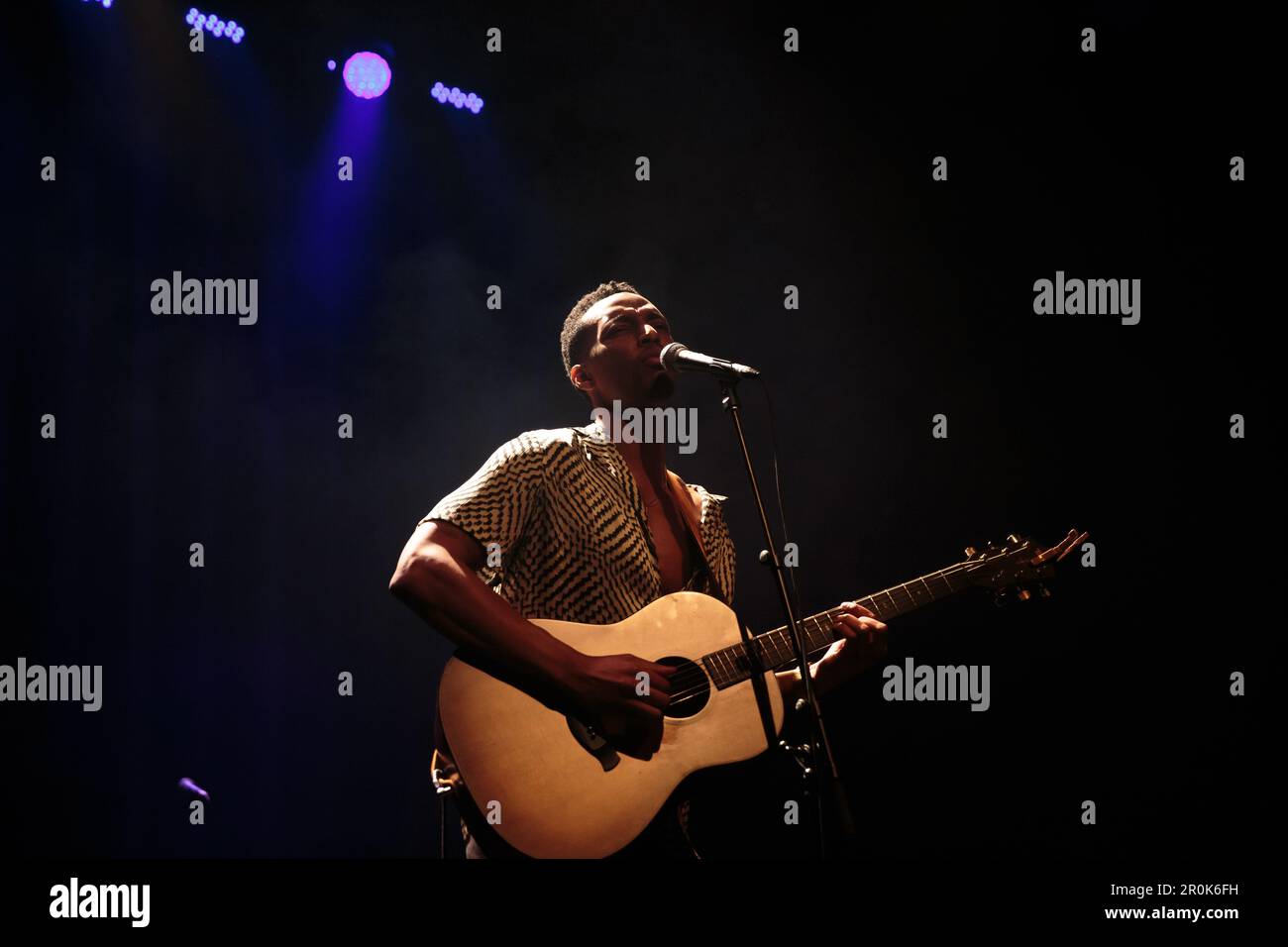 Toronto, Canada. 08th May, 2023. Joseph Solomon sings into a microphone ...