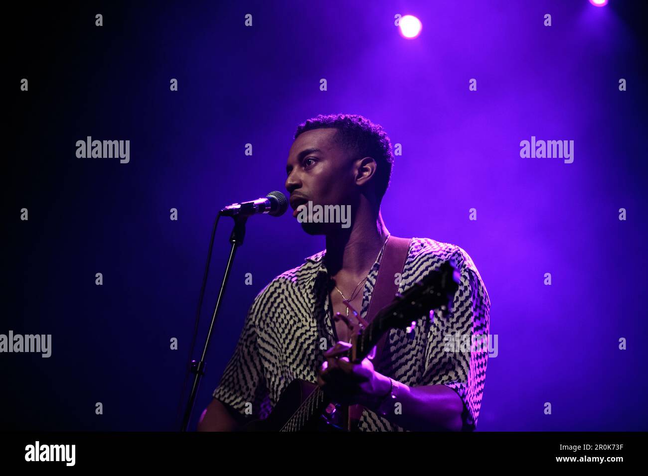 Toronto, Canada. 08th May, 2023. Joseph Solomon sings into a microphone ...