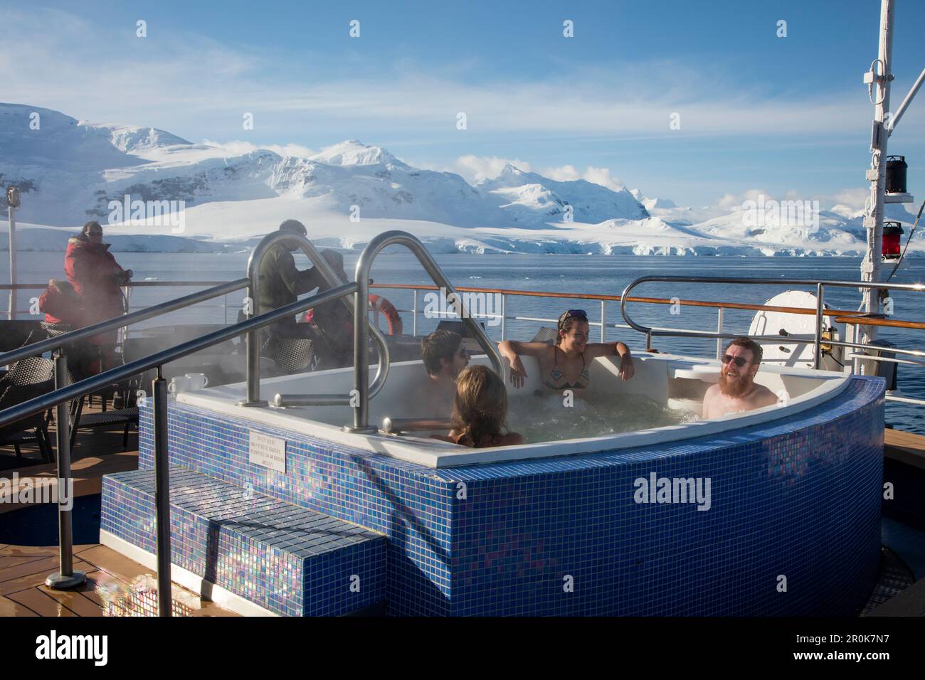 Passengers relax in a hot tub aboard expedition cruise ship MV Sea ...
