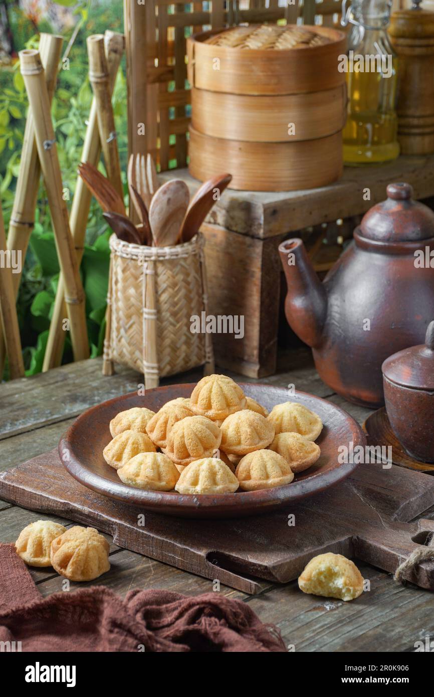 Kueh Bolu or Kuih Bahulu is a sponge cake. Asian traditional food is ...