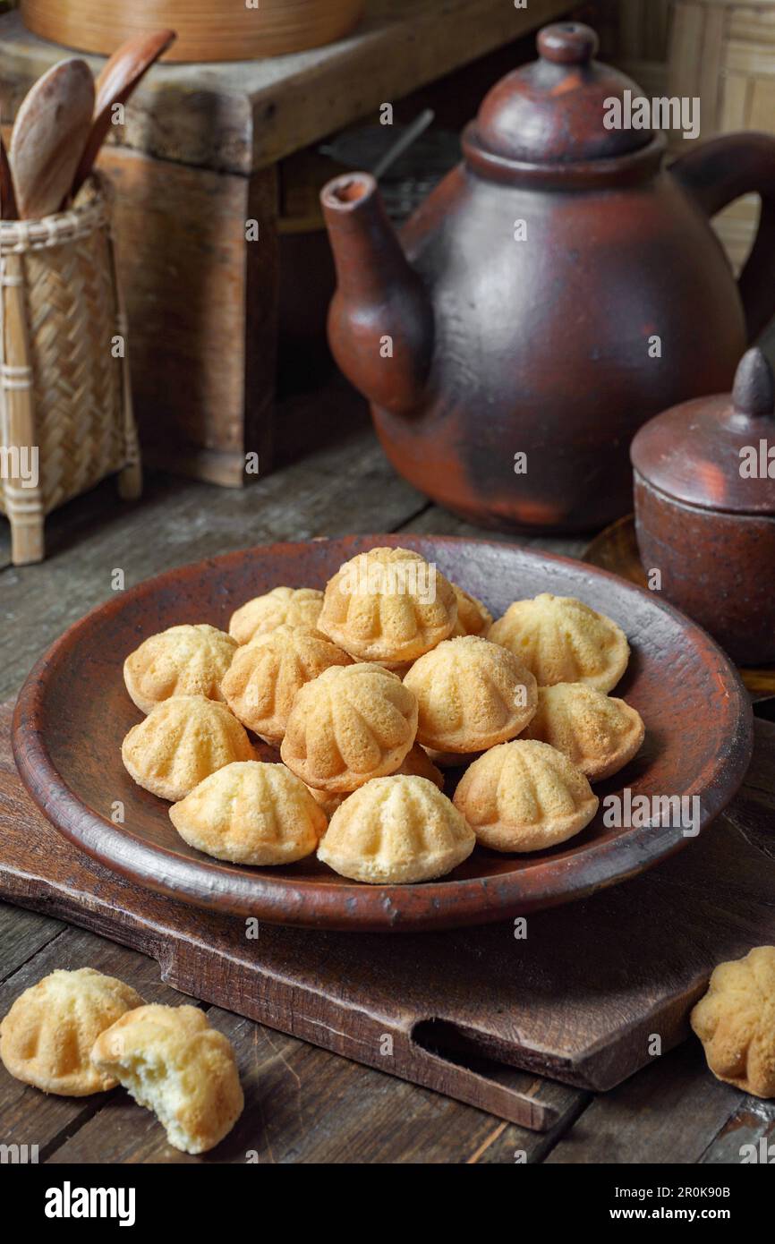 Kueh Bolu or Kuih Bahulu is a sponge cake. Asian traditional food is ...