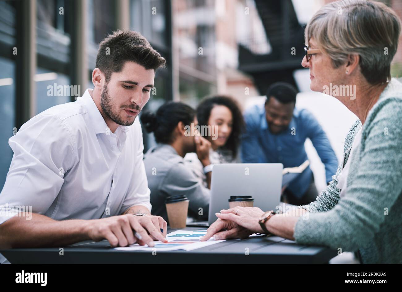 Working seamlessly and effectively as great teams do. a businessman and ...