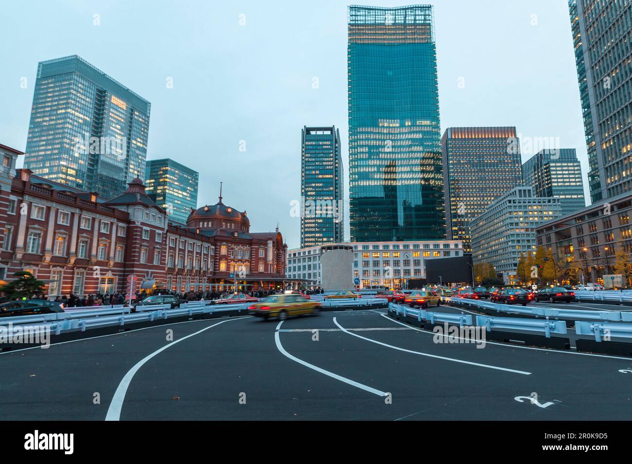 Taxi queue in front of Tokyo Station at blue hour, Chuo-ku, Tokyo ...